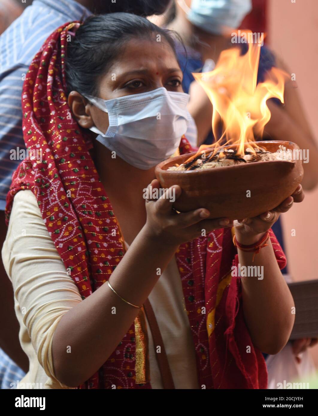 Guwahati, Guwahati, India. 9th Aug, 2021. Devotees offer prayer during ...