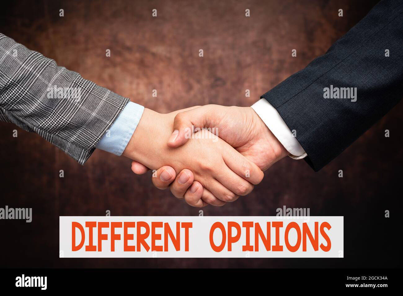 Hand writing sign Different Opinions. Concept meaning a conflict of ...