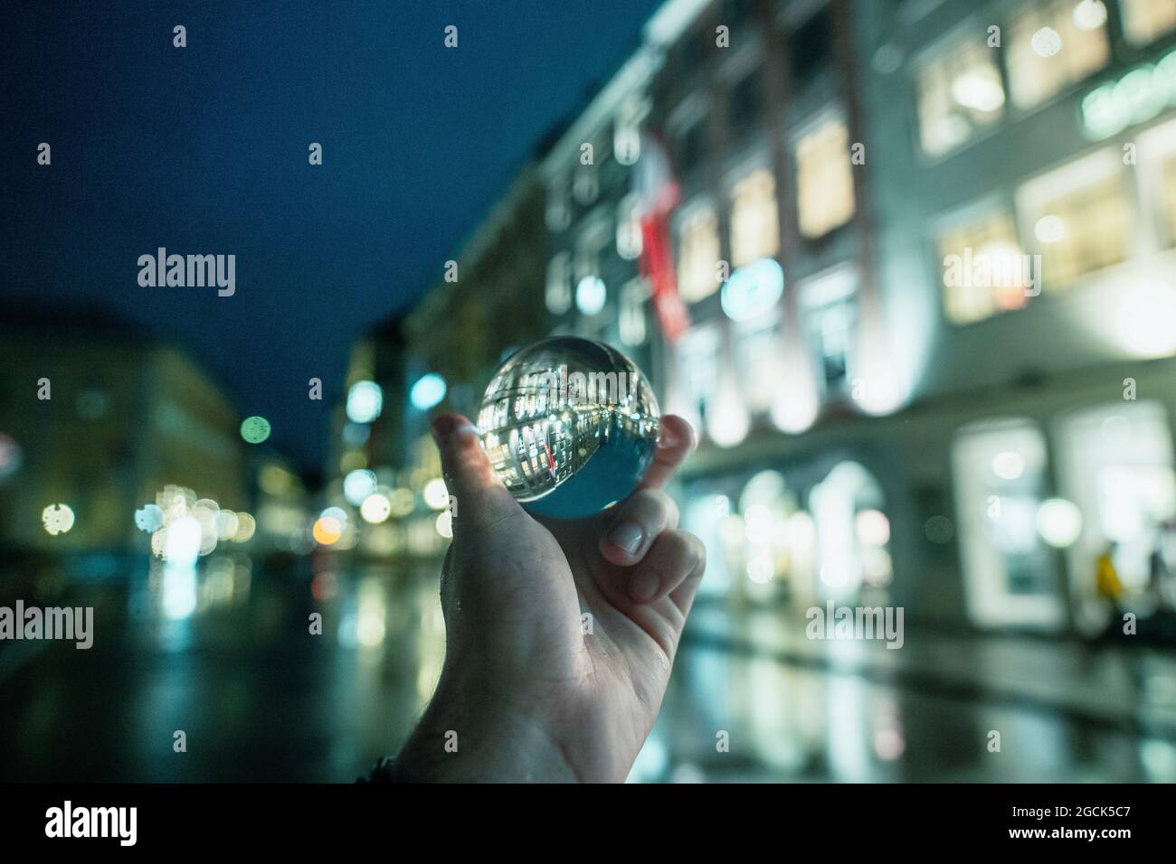 Hand holding glass sphere buildings architecture hi-res stock ...