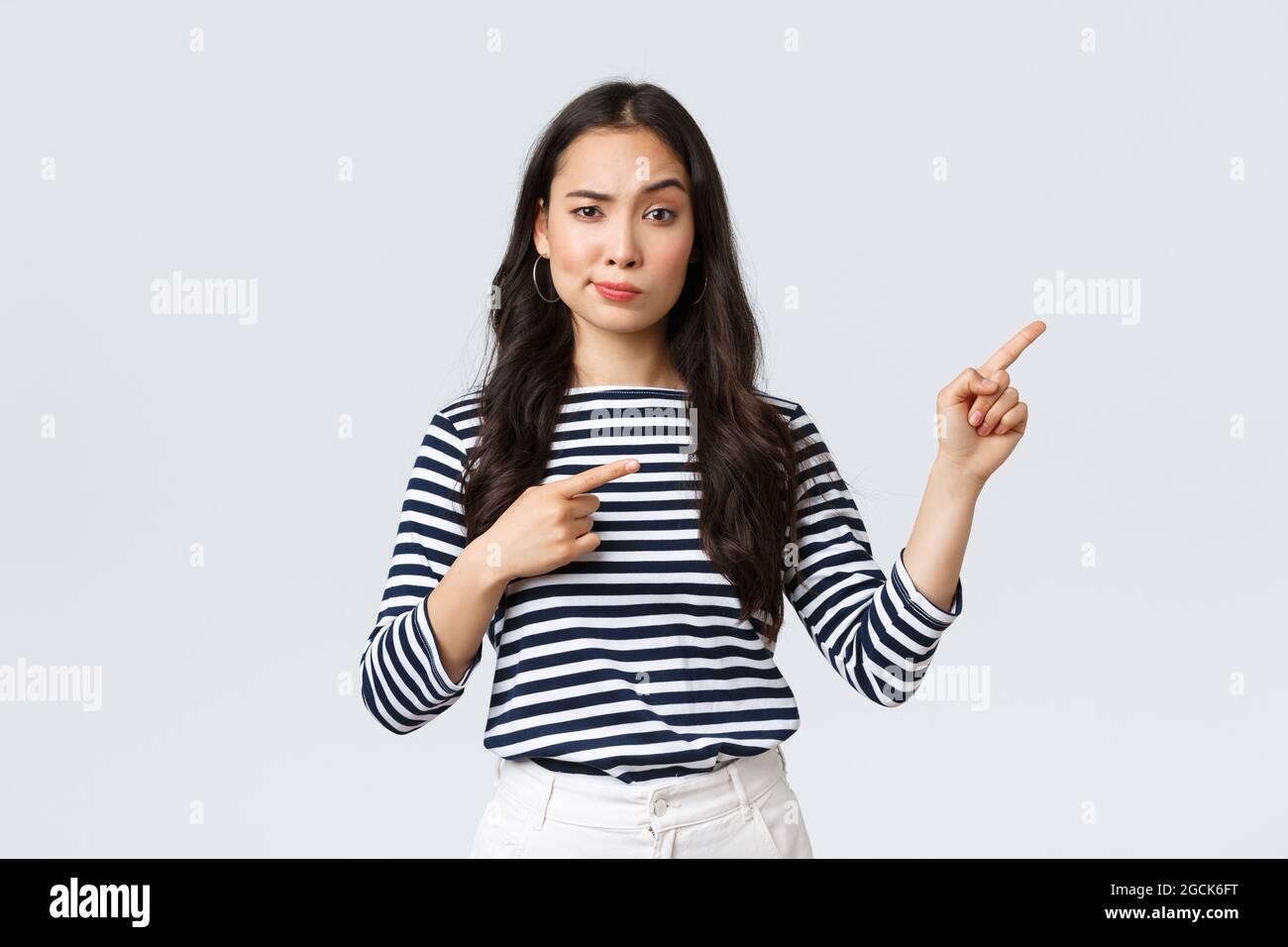 Lifestyle, beauty and fashion, people emotions concept. Skeptical and ...