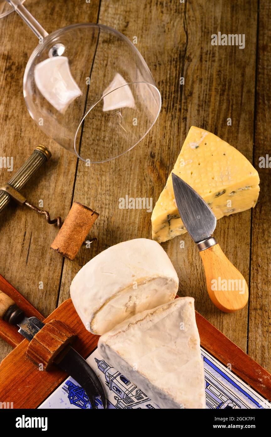 Mix of different kind of cheese on the table Stock Photo - Alamy