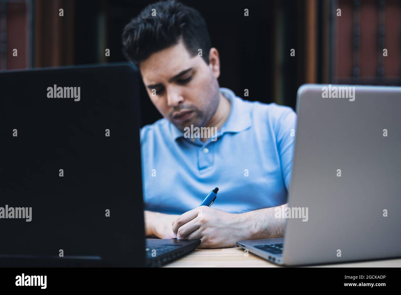 Man writing down hi-res stock photography and images - Alamy