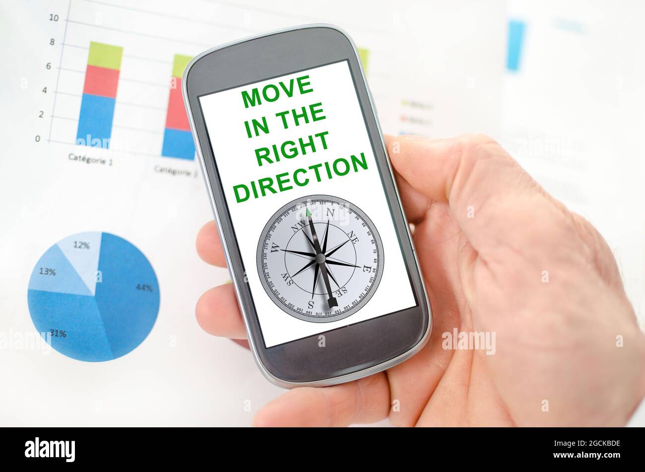 Right direction concept on a smartphone held by a hand Stock Photo - Alamy