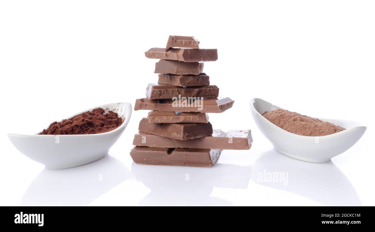 Stack of chocolate squares with cocoa powder, isolated on white Stock ...