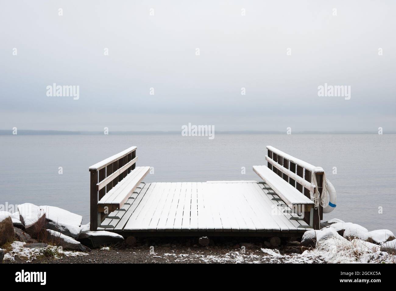 Pier at winter landscape Stock Photo - Alamy