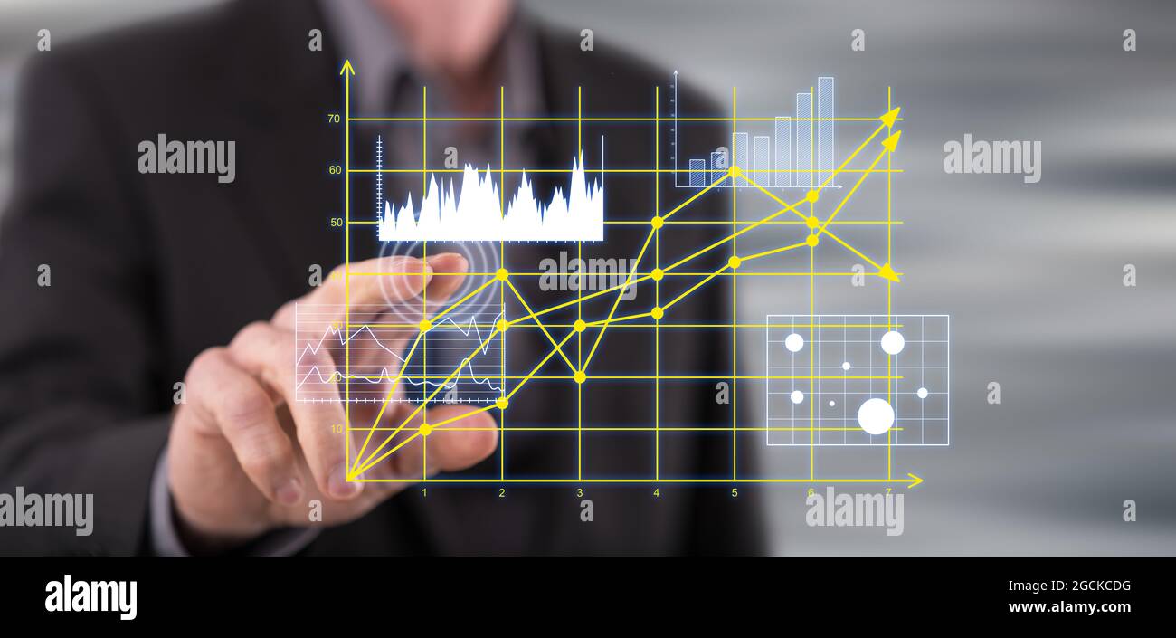 Man touching business charts on a touch screen with his finger Stock ...