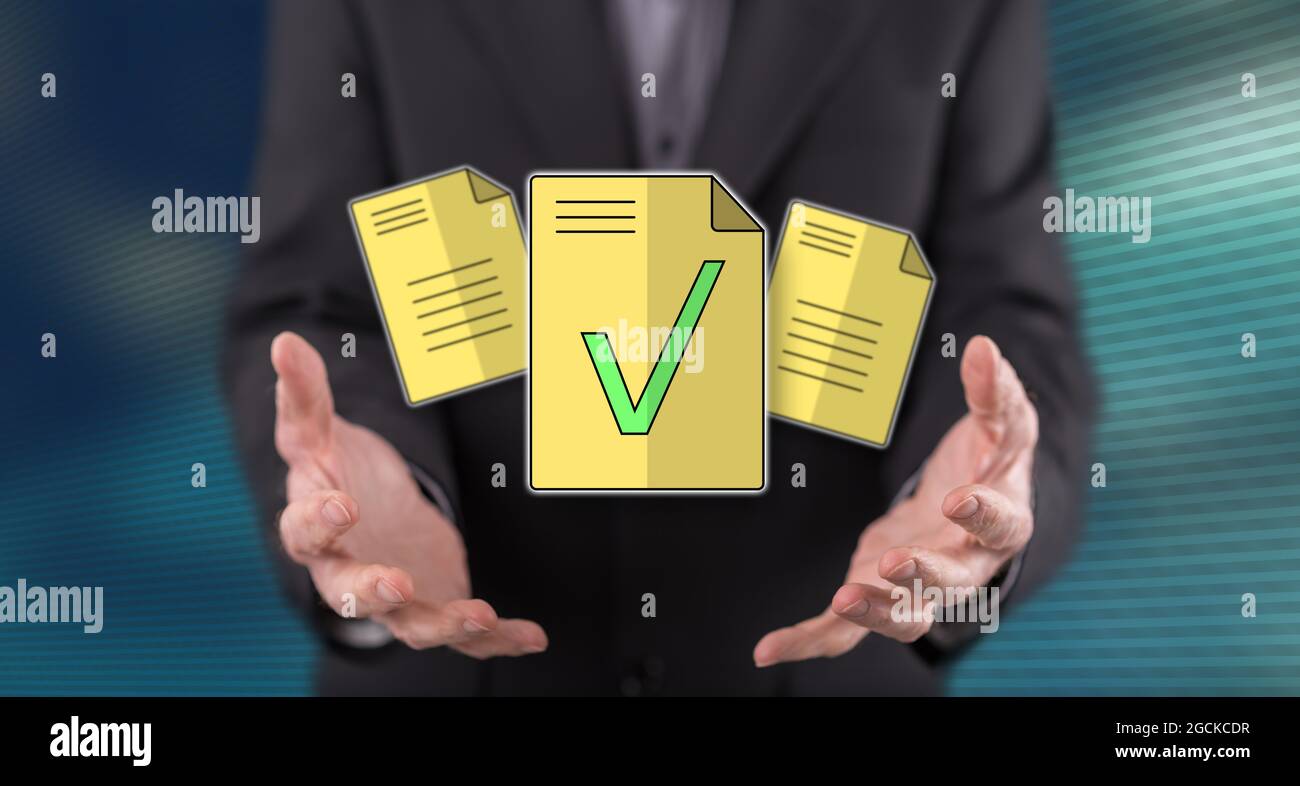 Document validation concept above the hands of a man in background ...