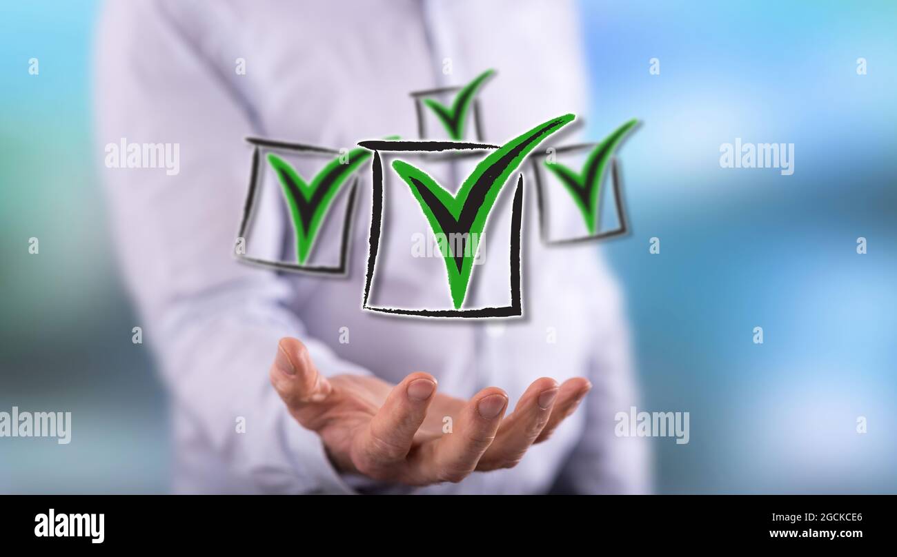 Validation concept above the hand of a man in background Stock Photo ...