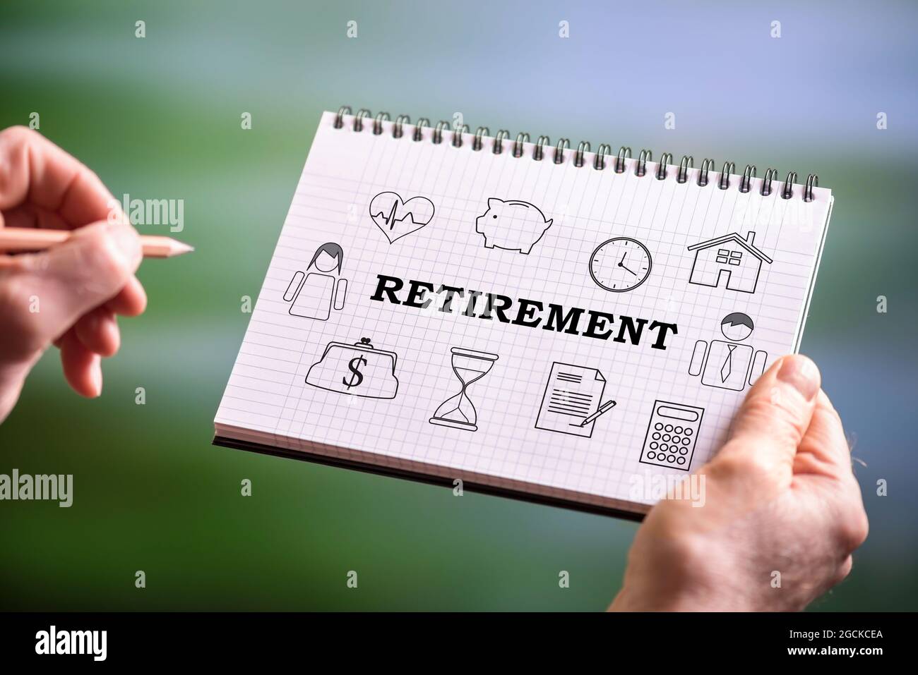 Hand drawing retirement concept on a notepad Stock Photo - Alamy