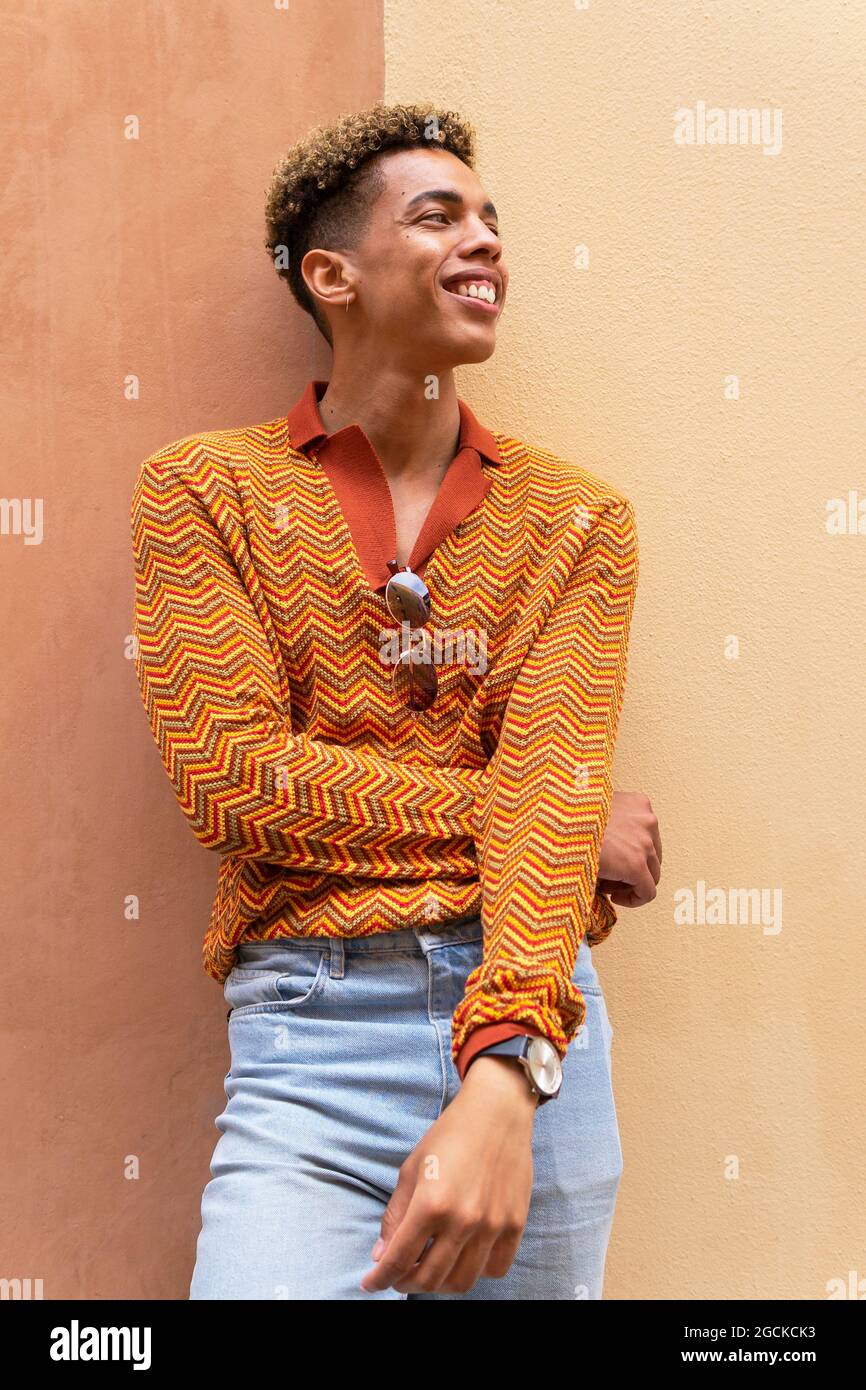 Happy young hairless lady taking selfie on smartphone while standing ...