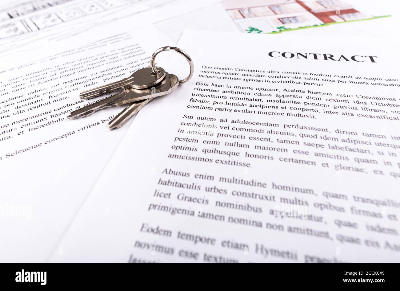 Real estate contract with keys (random latin dummy text used Stock ...