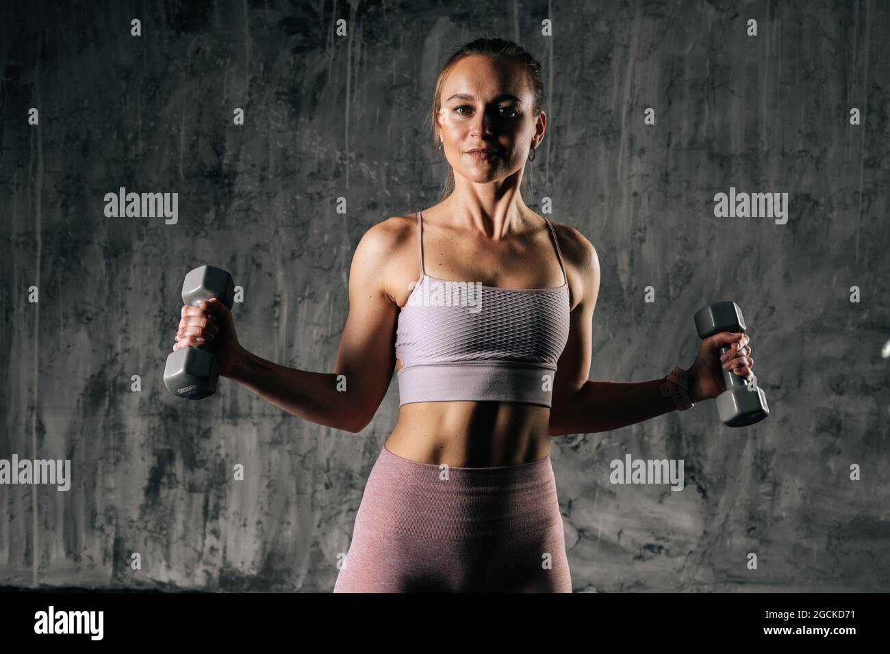 Middle shot portrait of young athletic woman with perfect beautiful ...