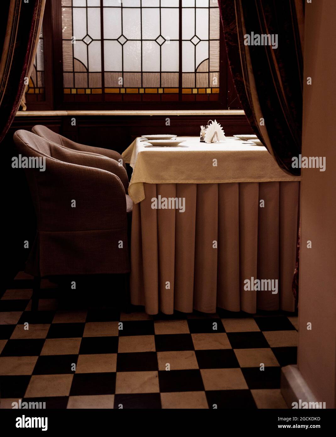 an empty table in a cafe. serving. interior of a European restaurant ...