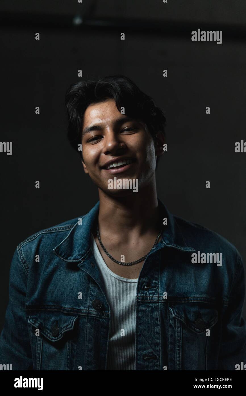 Looking at camera dramatic lighting hi-res stock photography and images ...