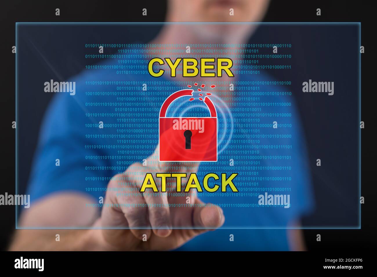 Man touching a cyber attack concept on a touch screen with his finger ...