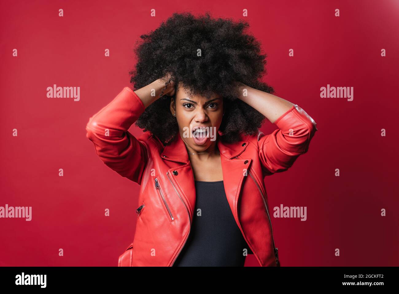 Naughty African American Female Screaming And Touching Hair While