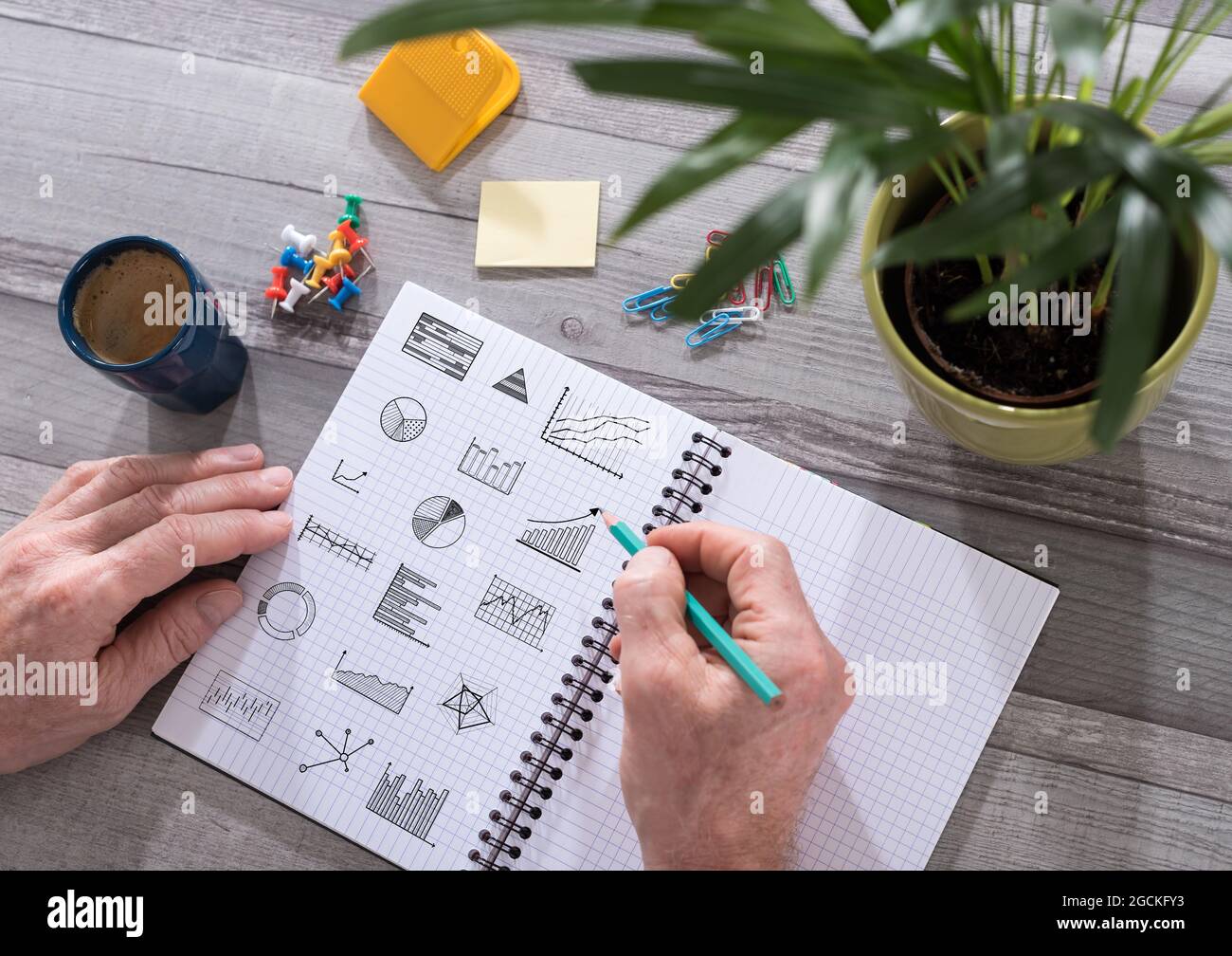Graphical analysis concept drawn on a notepad placed on a desk Stock ...