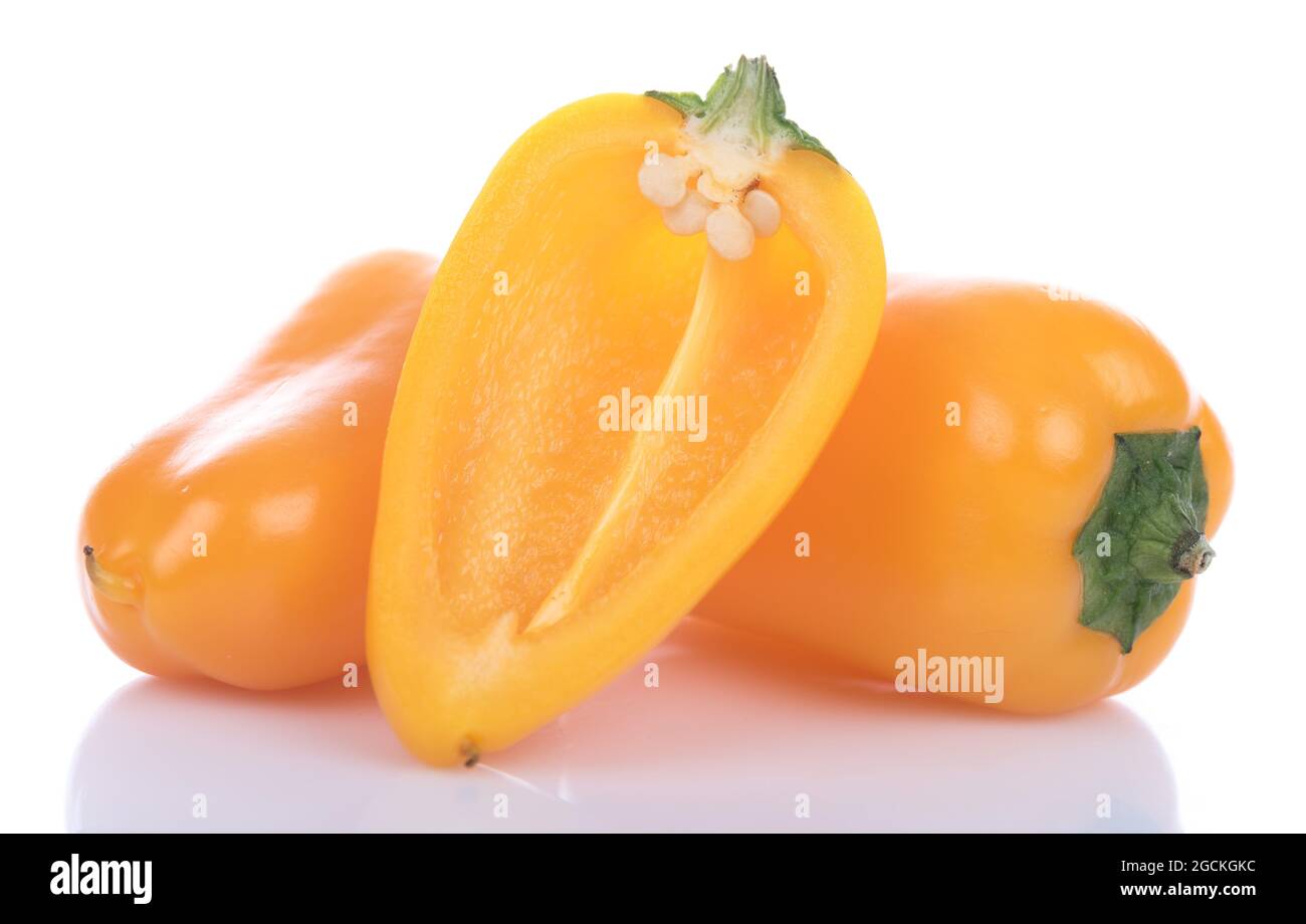 Fresh mini yellow peppers, isolated on white Stock Photo - Alamy