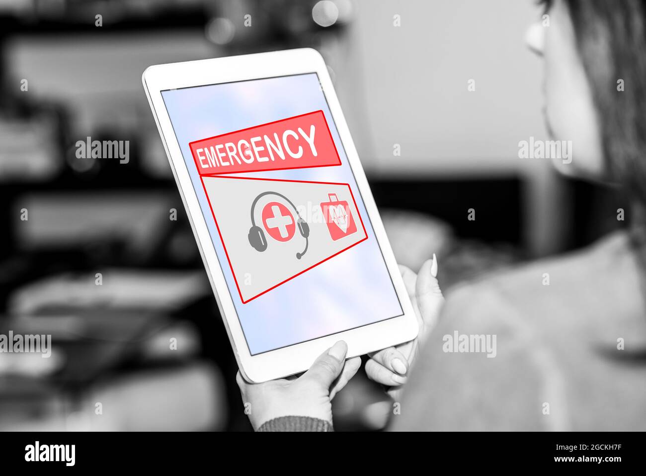 Tablet screen displaying an emergency concept Stock Photo - Alamy