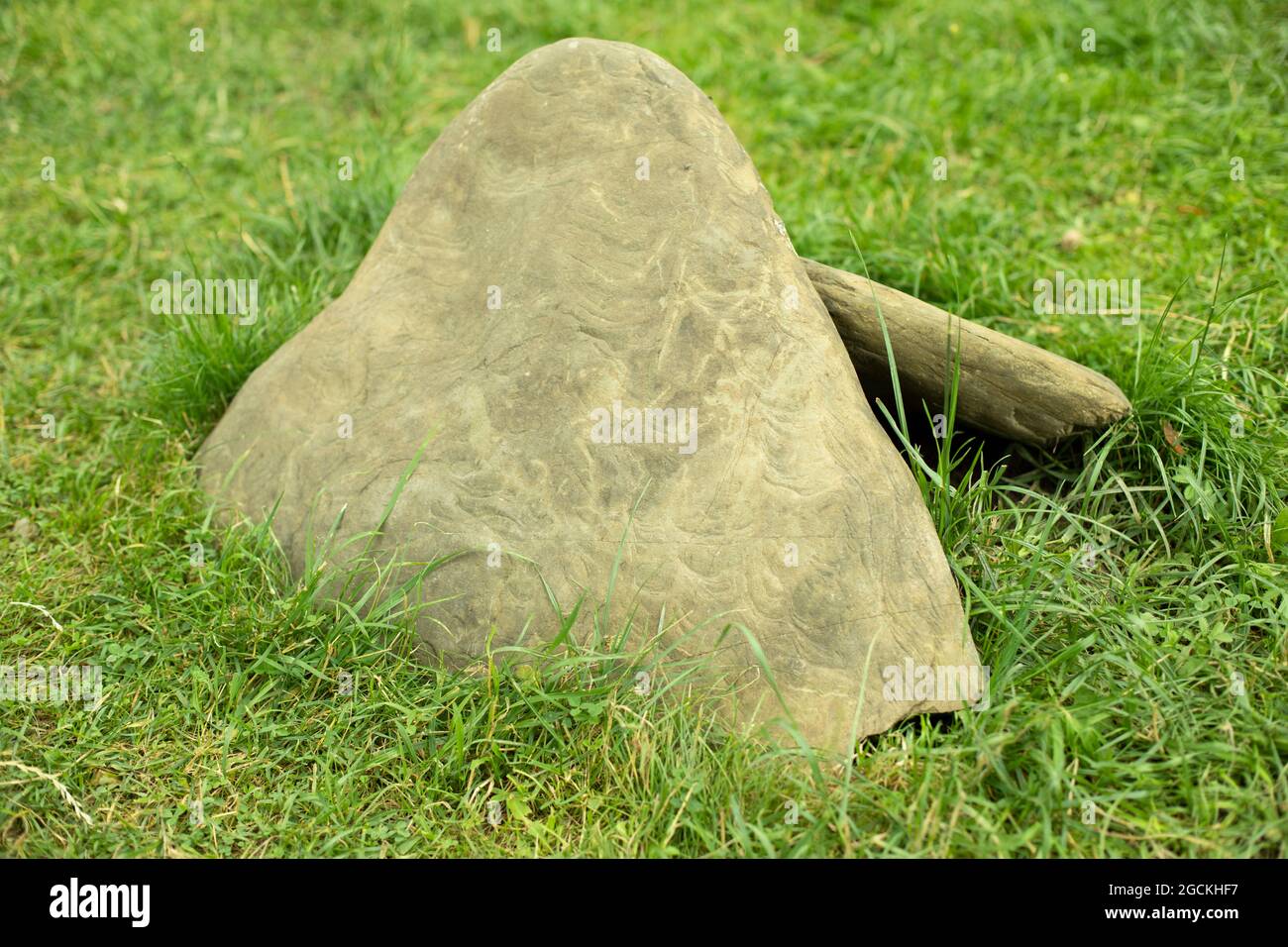 Stone in the garden. Cobblestone in the park. Landscaping in detail ...