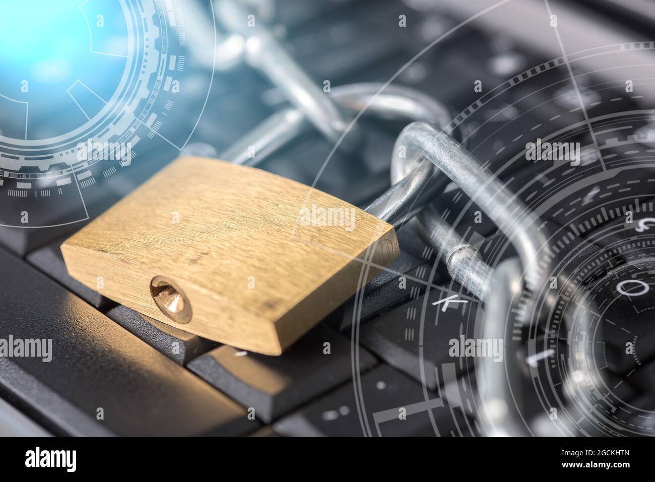 Computer security concept with a padlock and a chain on a keyboard ...