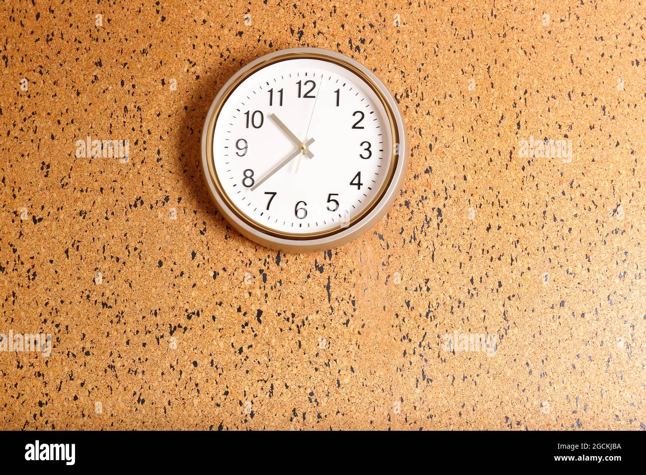 Clock on wall background Stock Photo - Alamy