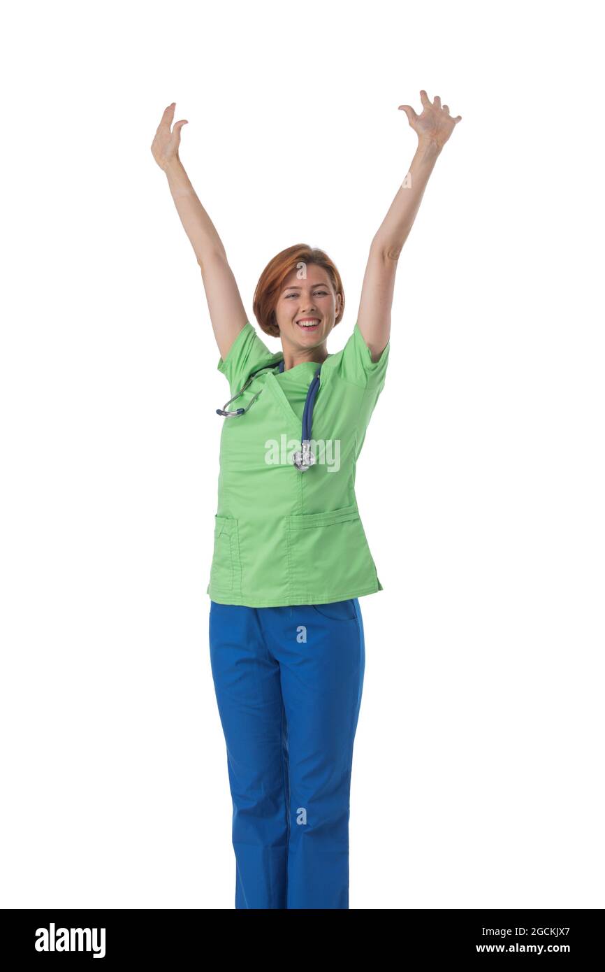 Happy cheerful excited woman nurse with arms up. Isolated on white ...