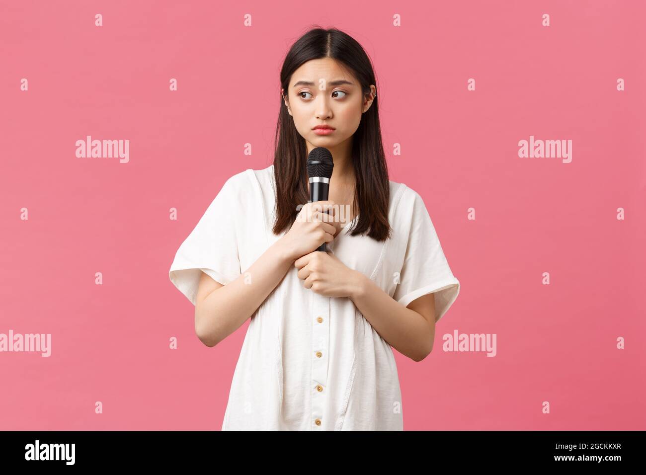 Leisure, people emotions and lifestyle concept. Shy and worried cute ...