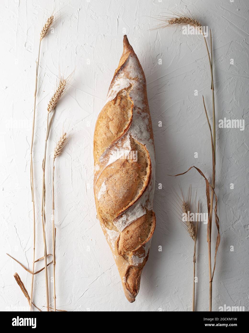 Top view composition of delicious freshly baked rustic artisan baguette ...
