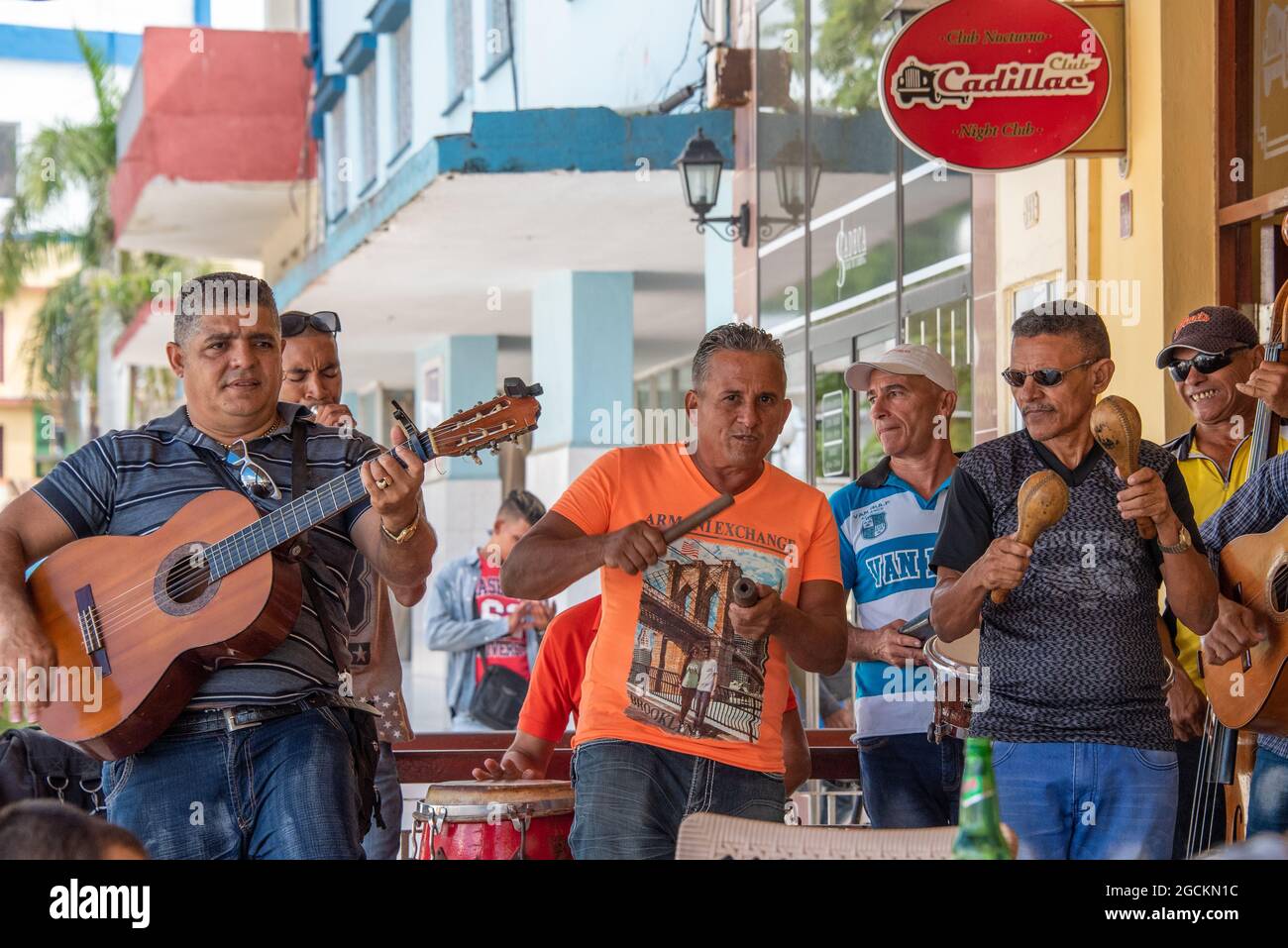 Group of Cuban musicians playing life in a cafeteria or patio ...