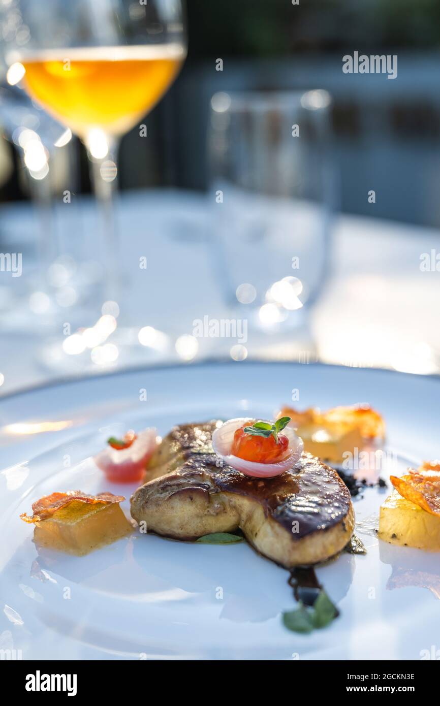 Delicious and well garnished fried goose liver dish at outdoor high ...