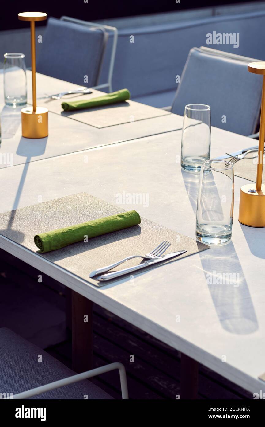 Table set up ready for food and drinks at outdoor high cuisine ...