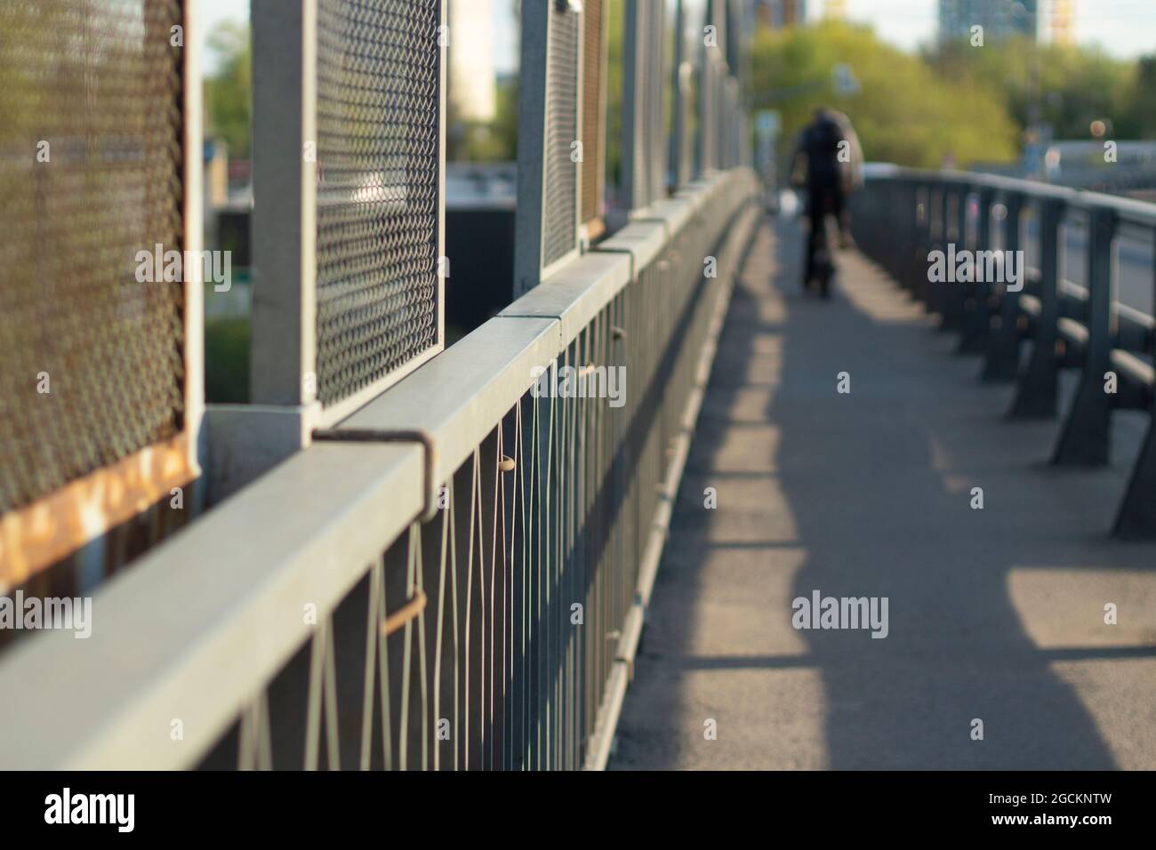 Bridge over the highway. Pedestrian road along the machine bridge ...