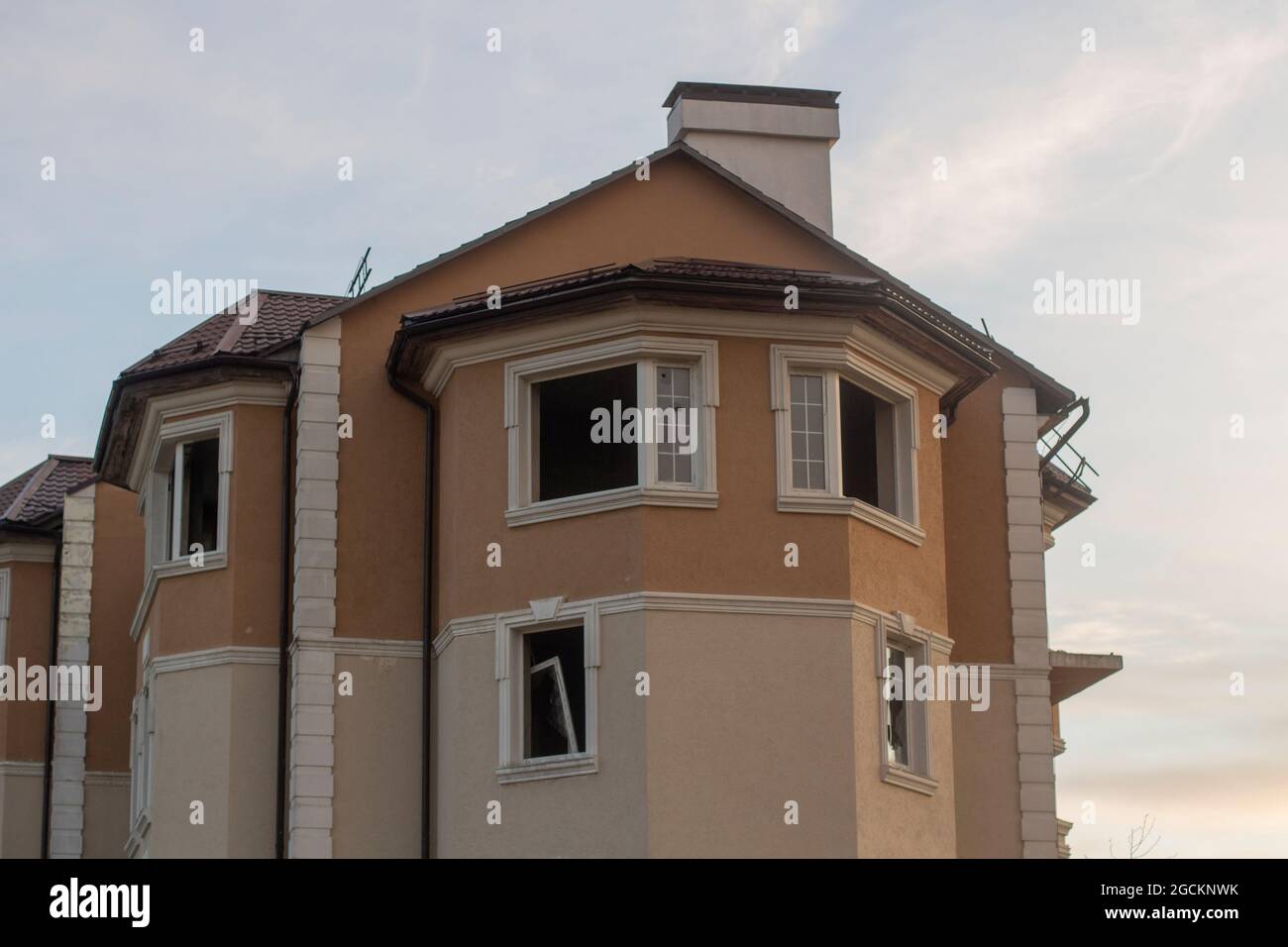 Abandoned country house. Cottage without windows. Unfinished house ...