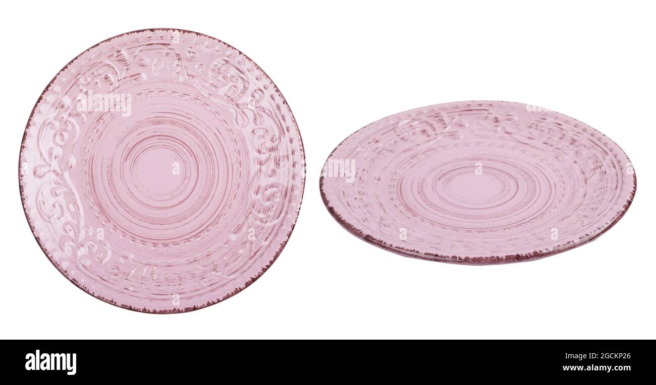 Pink ceramic plate isolated on white background. View from side and ...