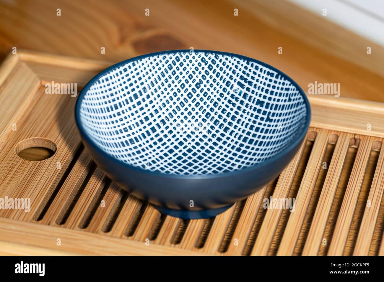 Blue and white checkered ceramic tea bowl in Japanese style Stock Photo ...