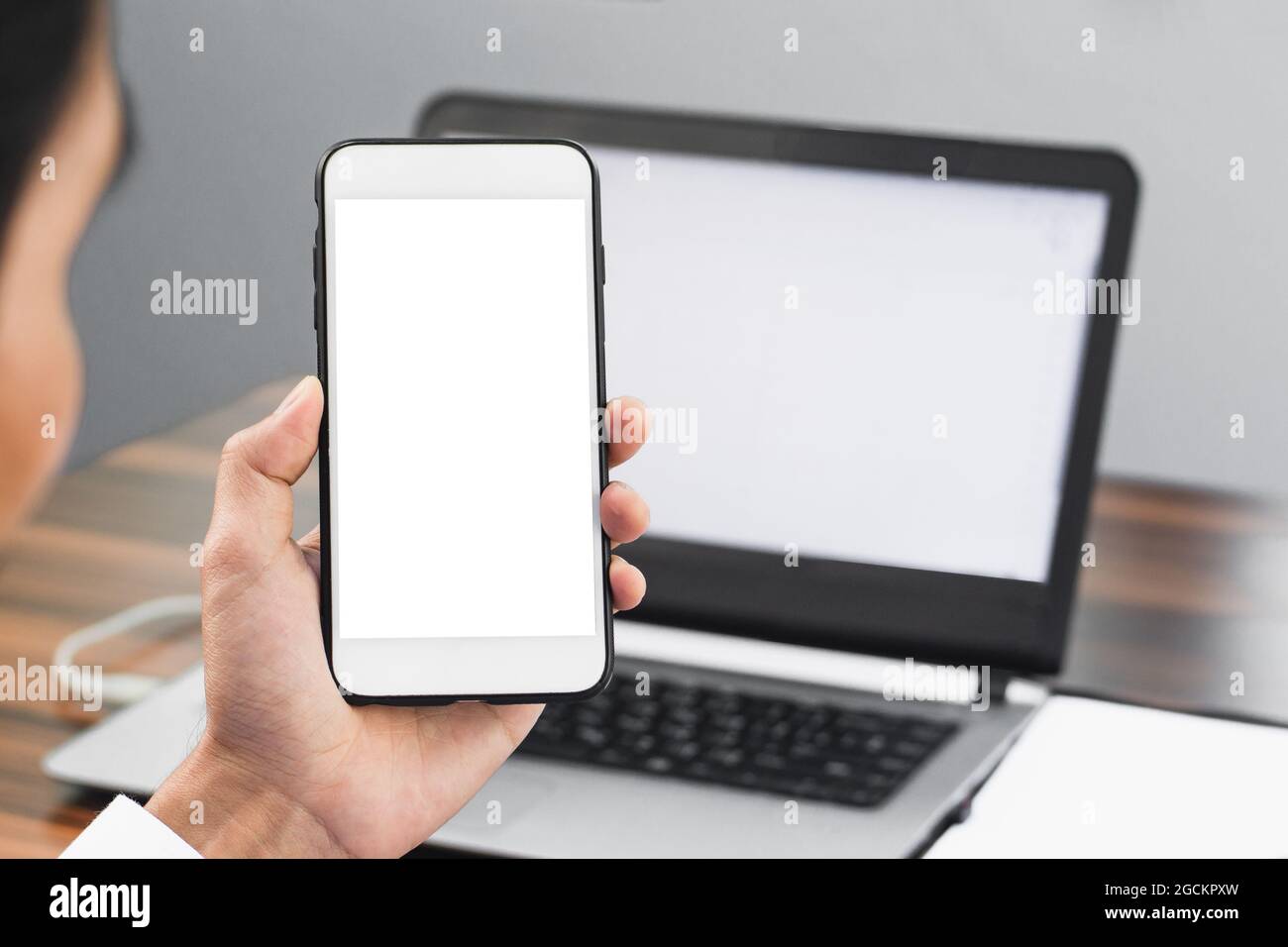 Closeup hand holding smartphone mockup screen background technology ...