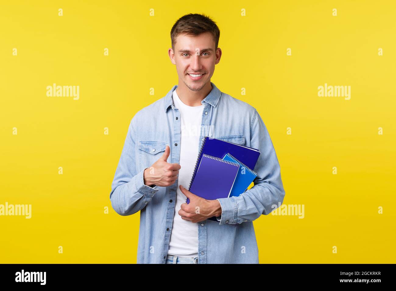 Education, courses and university concept. Handsome smart male student ...