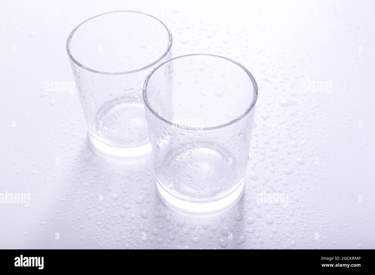 Empty glasses, isolated on white Stock Photo - Alamy