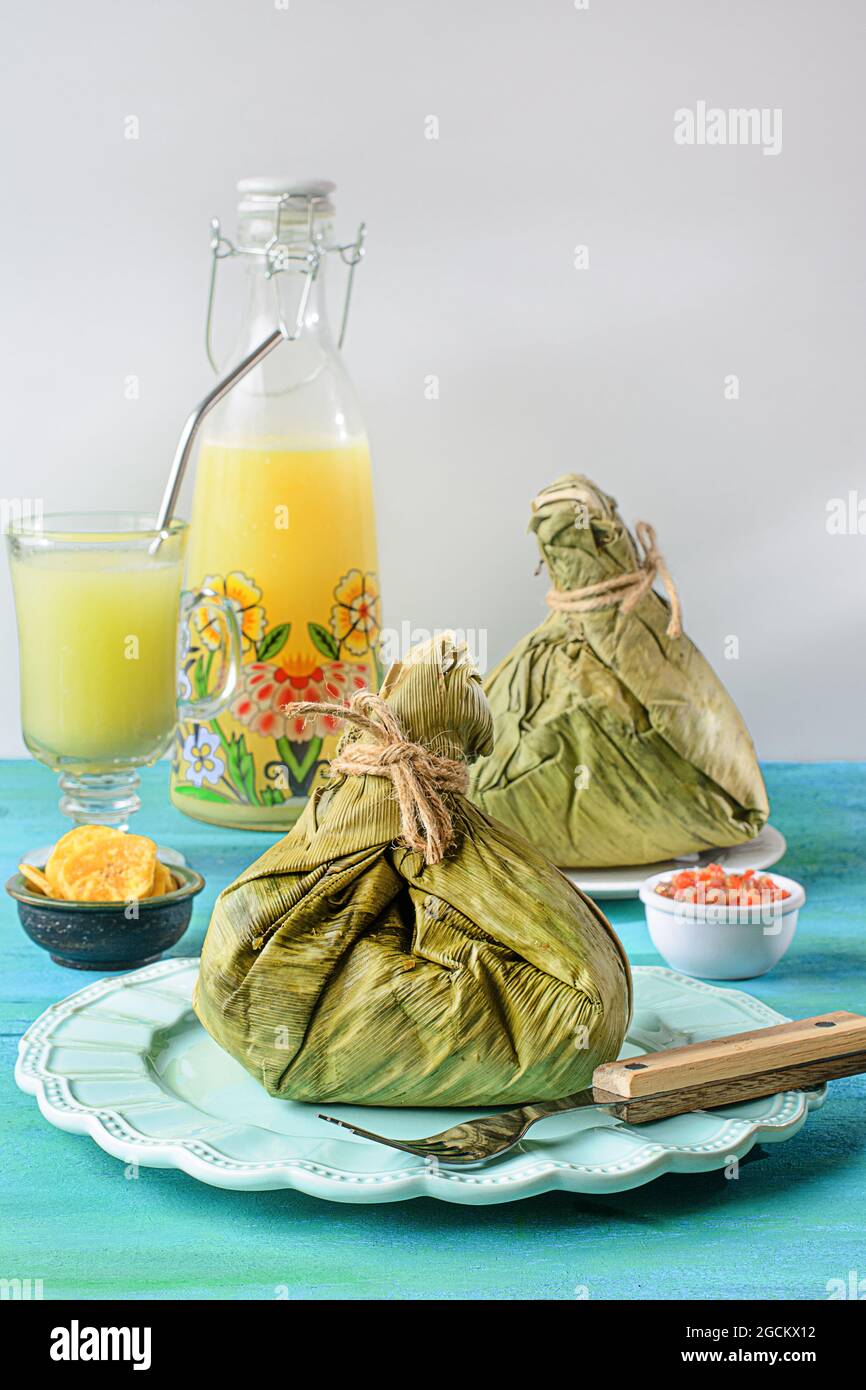 Prepared of Juanes, typical amazonic food in plantains leaves. Typical ...