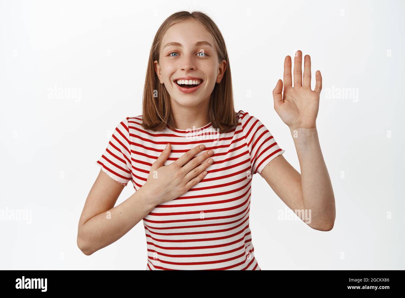 Hand on chest woman happy hi-res stock photography and images - Alamy