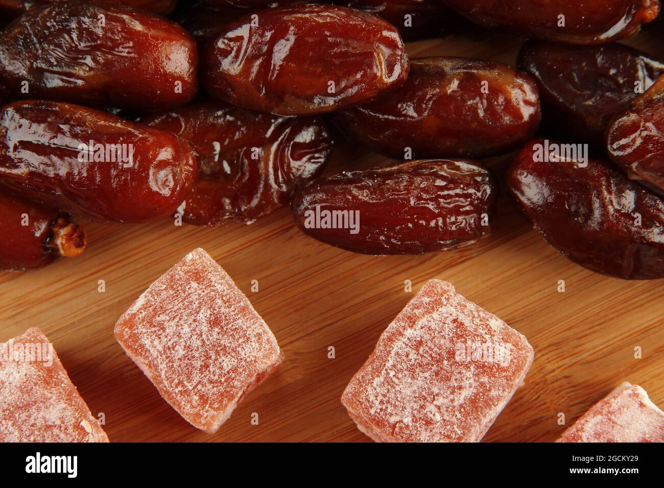 Dried dates with Turkish delights close up Stock Photo - Alamy