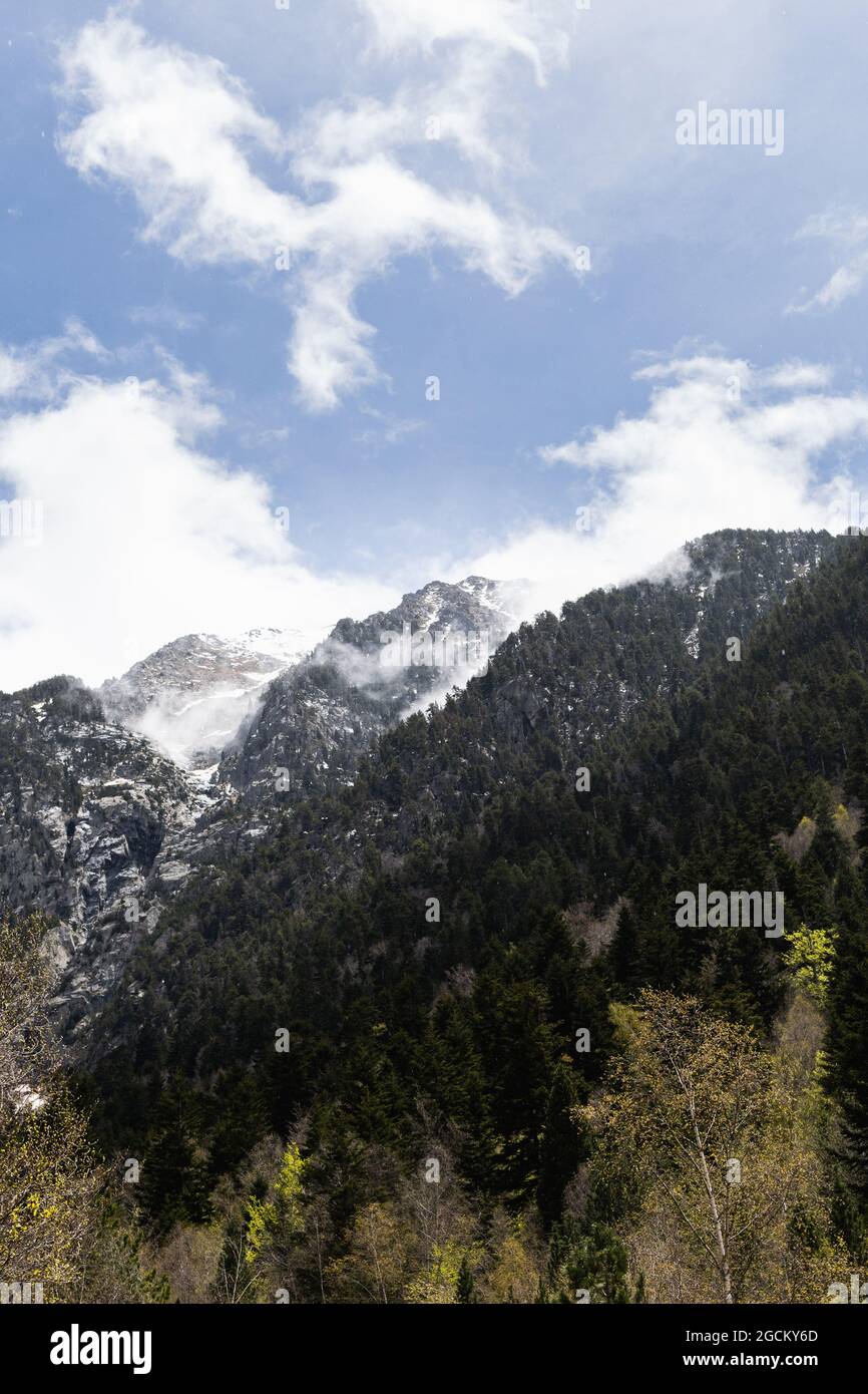 Breathtaking landscape of Pyrenees mountain range covered with snow and ...
