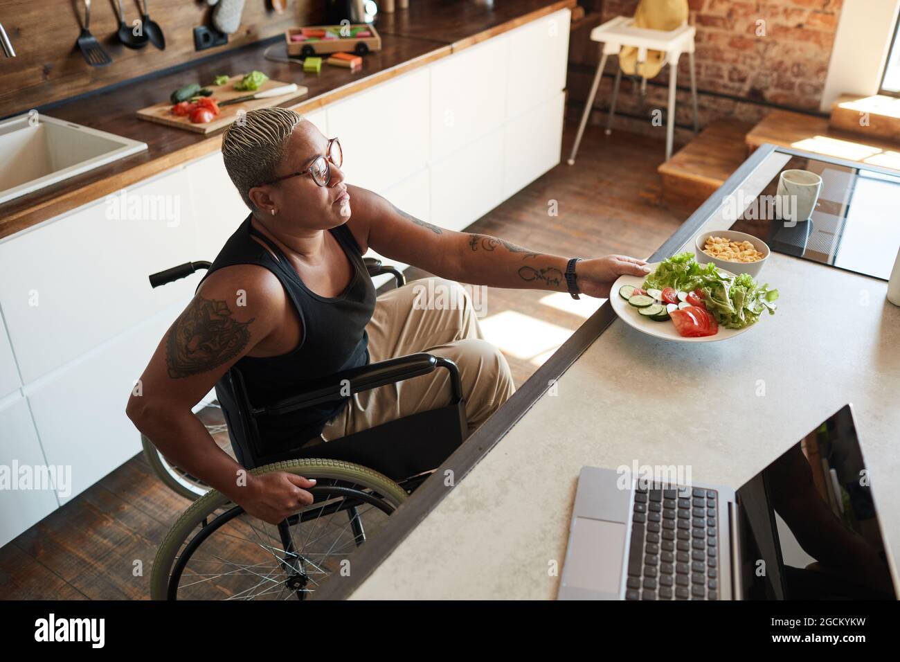 Adult baby wheelchair hi-res stock photography and images - Alamy