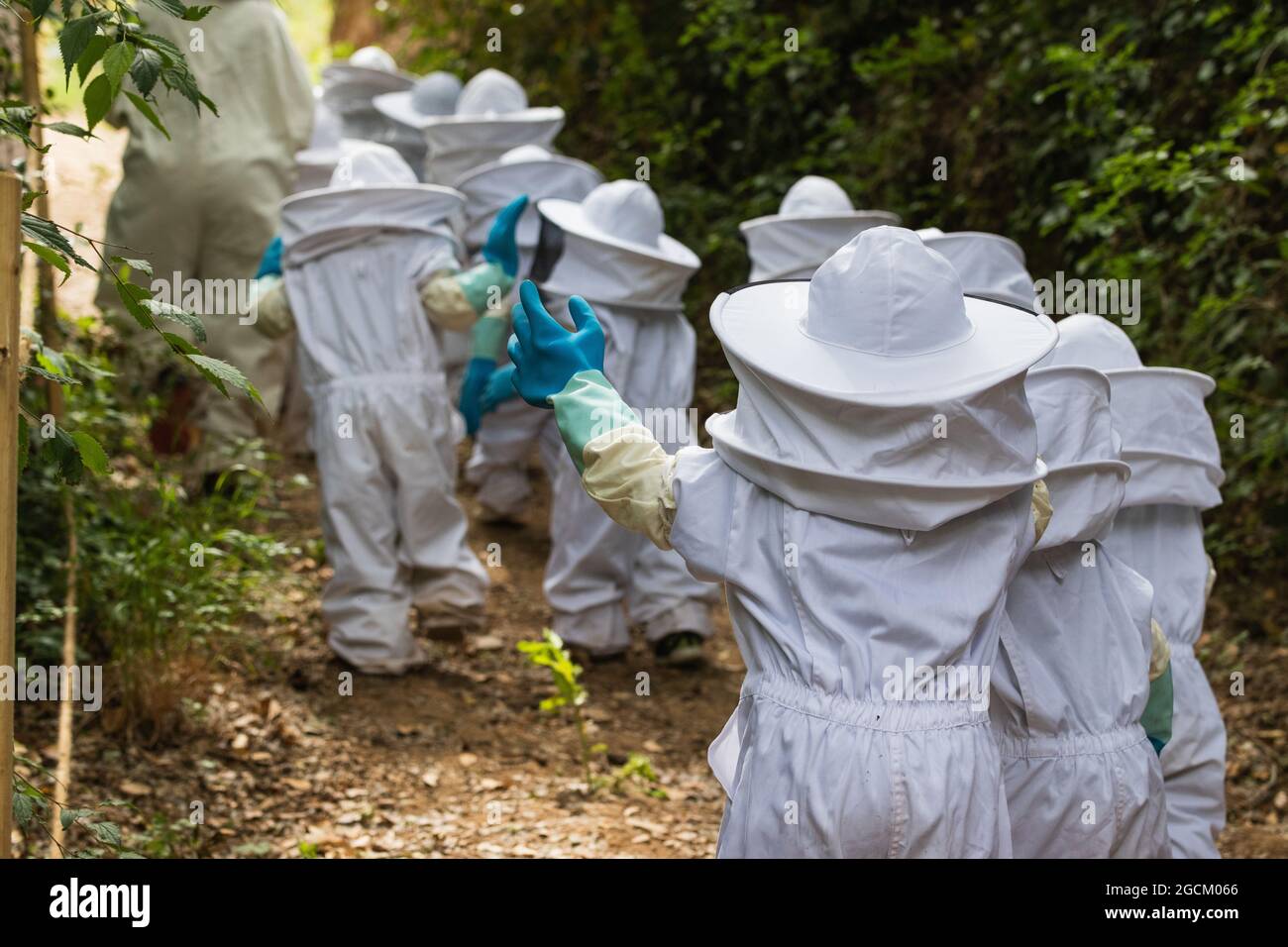 Back view of group of unrecognizable children in protective costumes ...