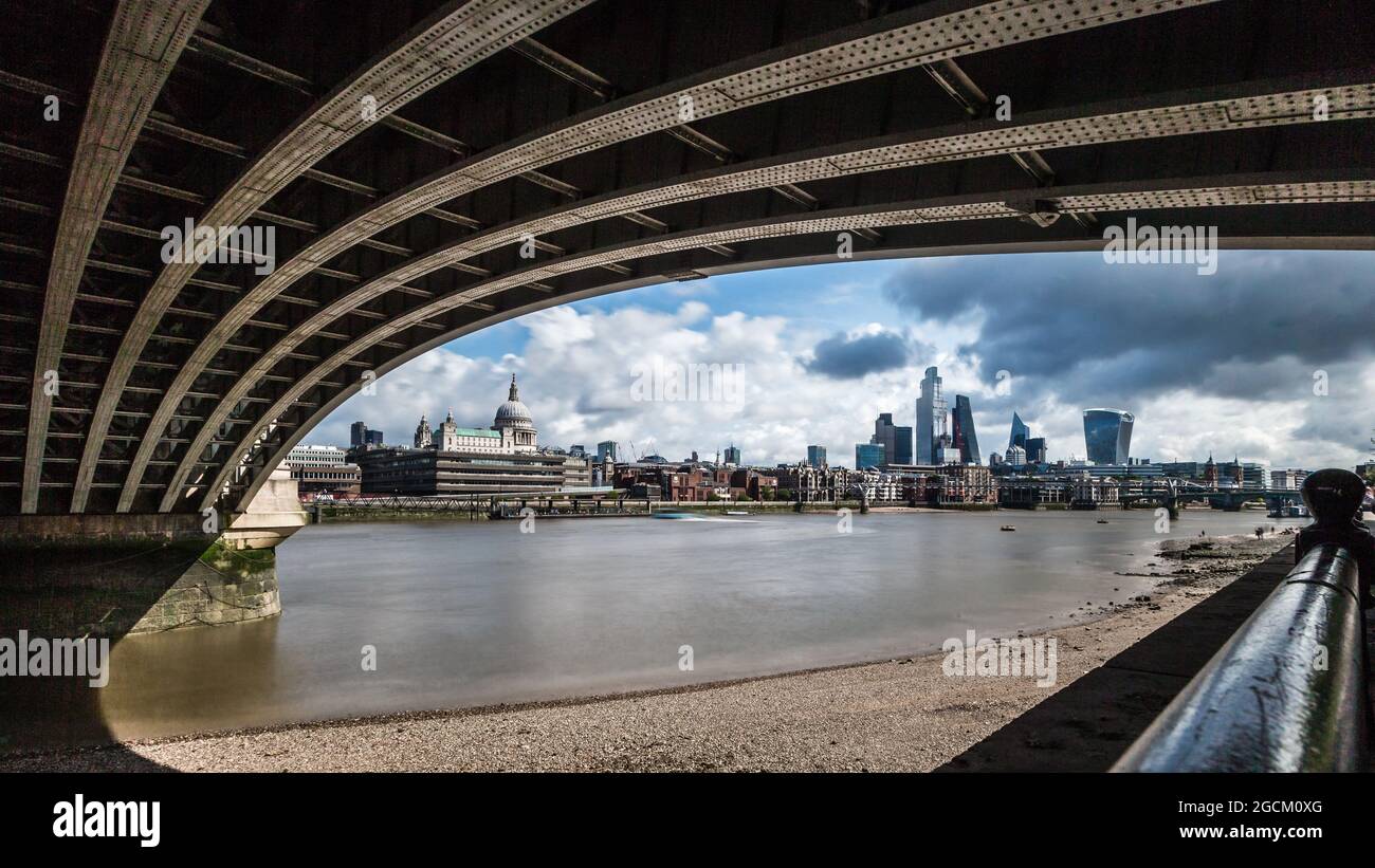Panoramic view of the city of London from under Blackfriars Bridge ...