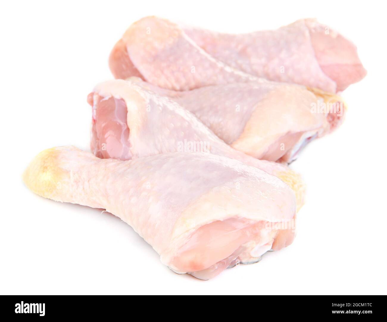 Raw chicken legs isolated on white Stock Photo - Alamy