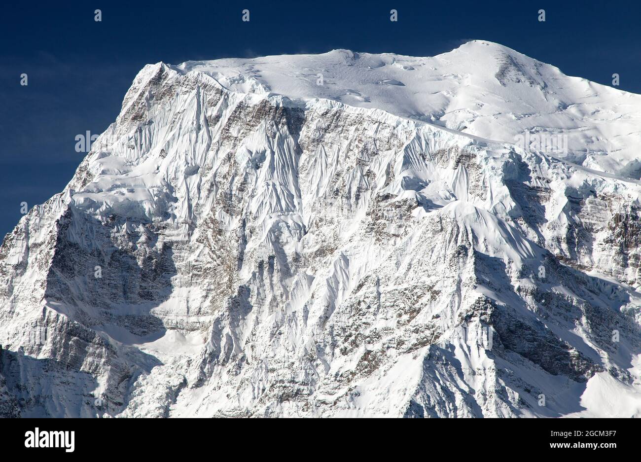 View of south rock face of mount Annapurna 3 III, Annapurna range ...