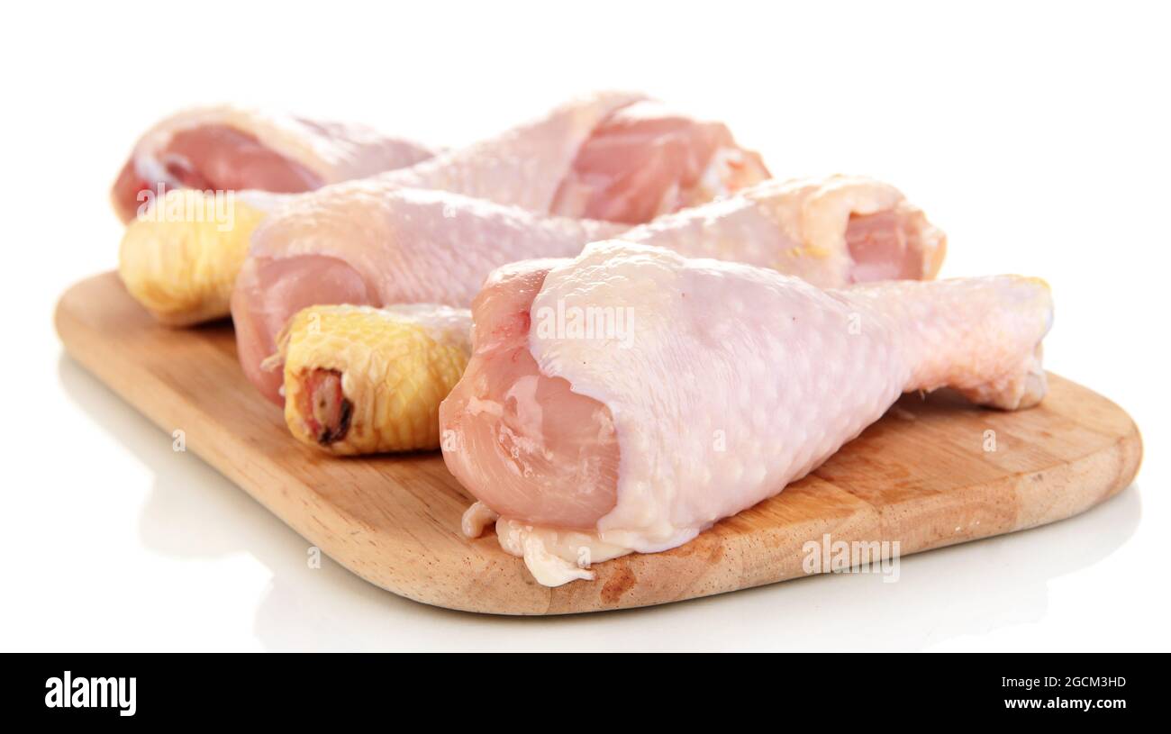 Raw chicken legs isolated on white Stock Photo - Alamy