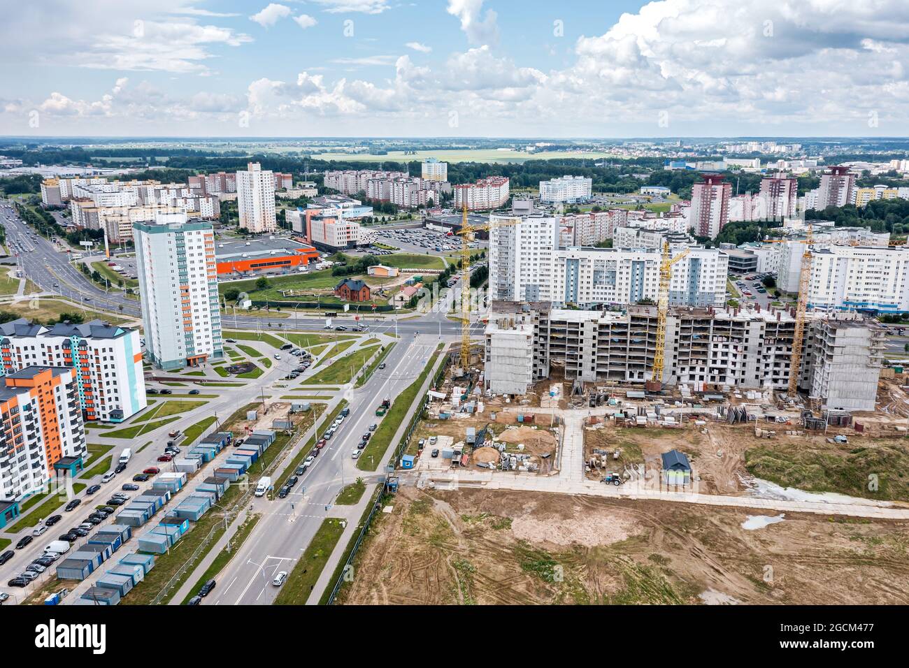 new high-rise apartment building under construction in city residential ...